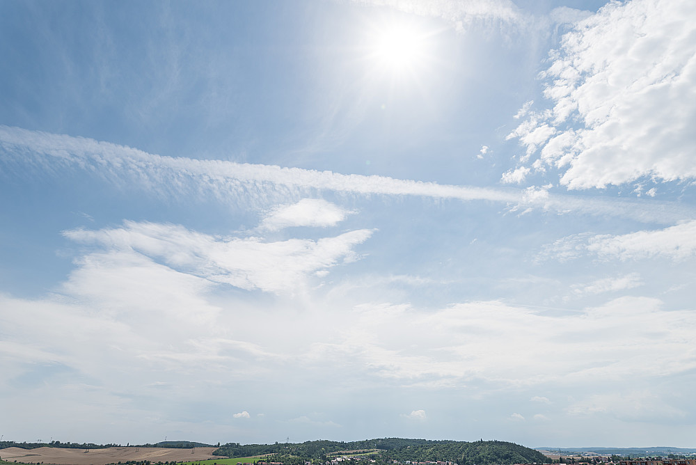 Photo #491 with sky, medium-clouds, day, plane-trails, sun ...